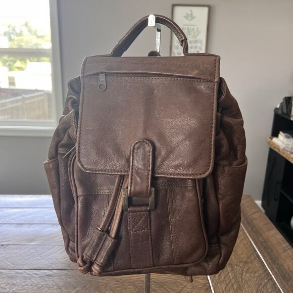 Wilson | Bags | Vintage Brown Leather Backpack Wilsons Side And Front ...